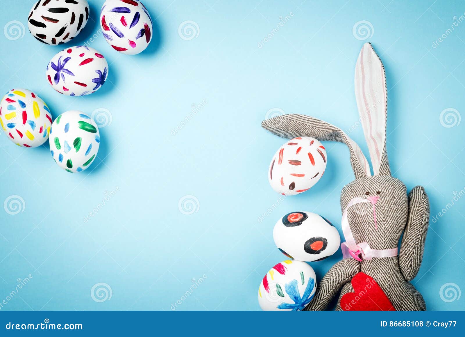 Easter Bunny on a Blue Background Stock Photo - Image of eggs, colored ...