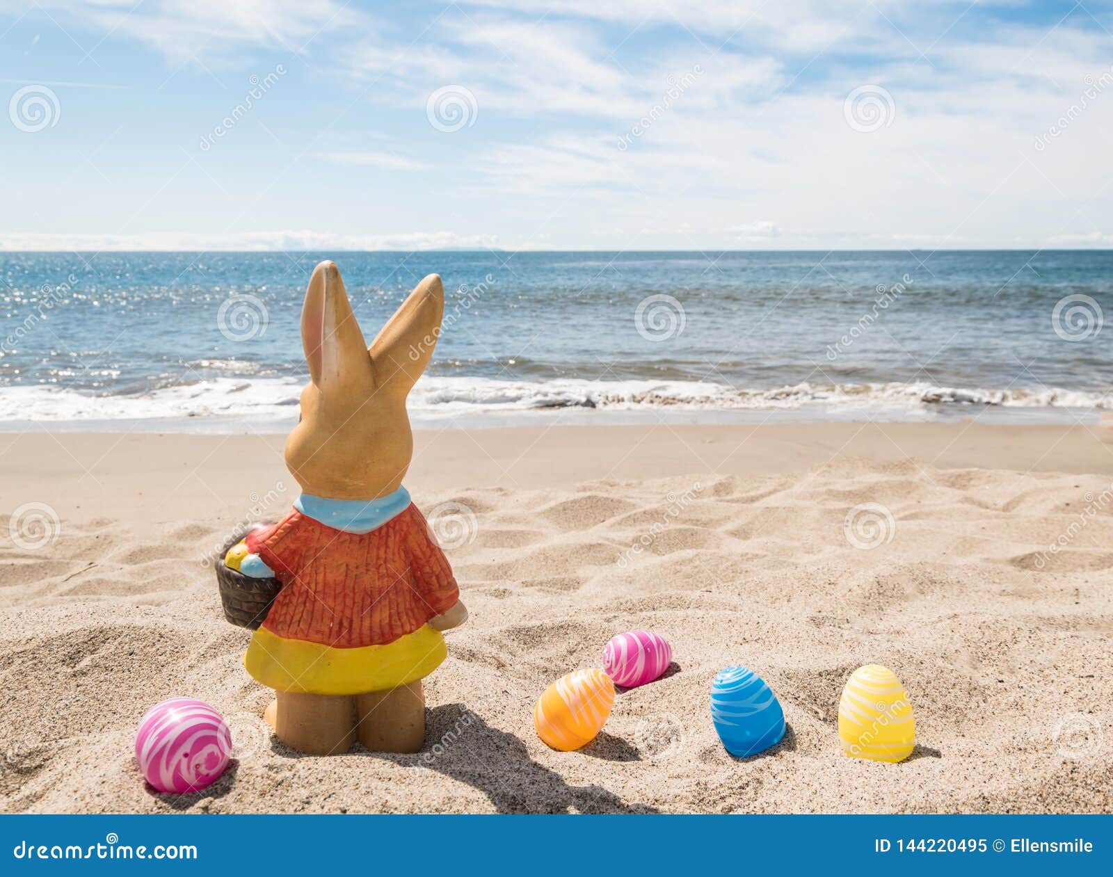 Easter Bunny with Color Eggs on the Ocean Beach Stock Image - Image of ...