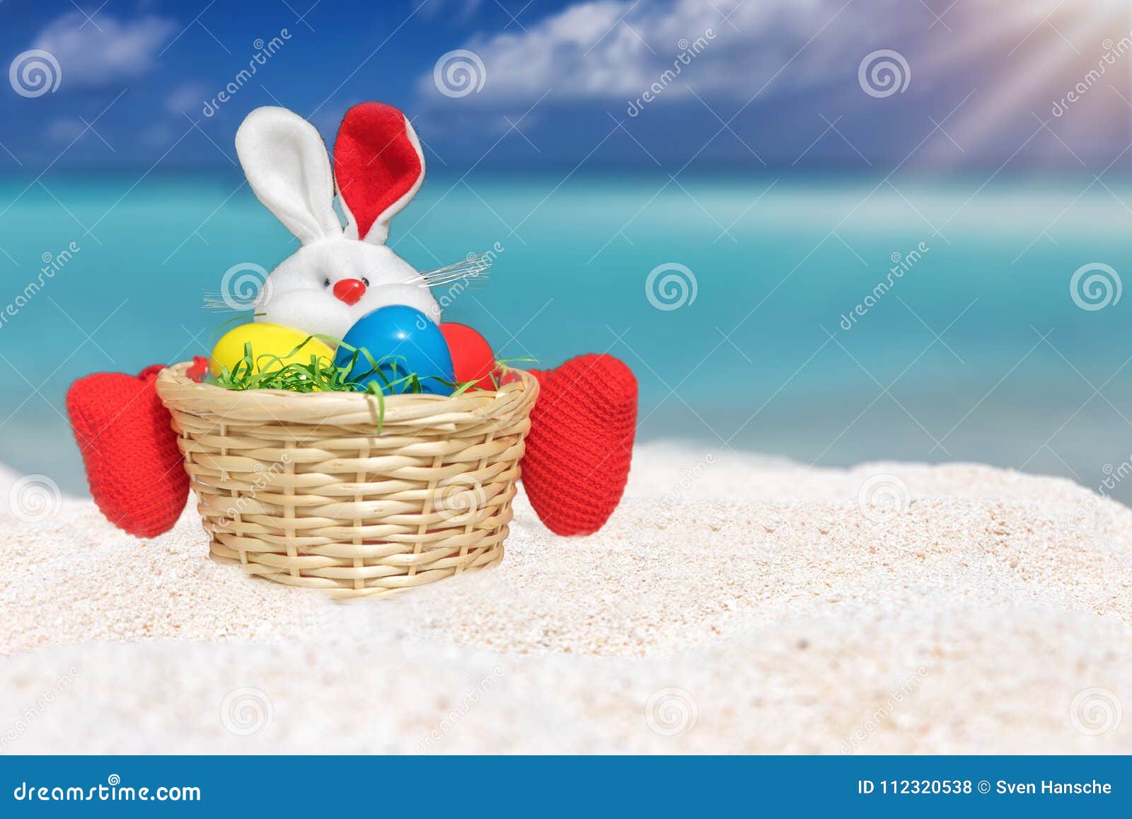 Easter Bunny with Colored Eggs on a Tropical Beach Stock Photo - Image ...