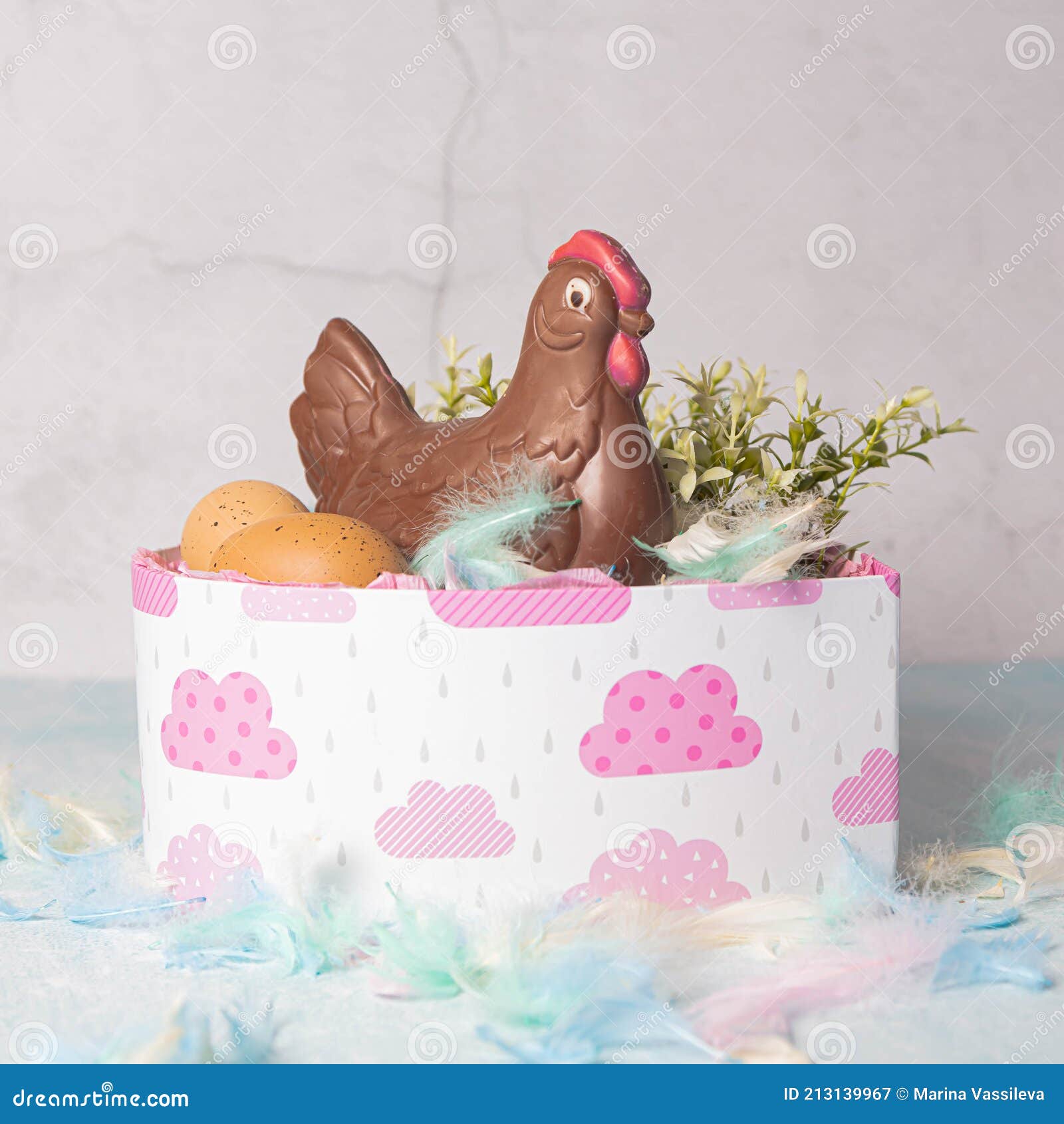 Easter Chocolate Chicken and Chicken Eggs in a Pink Box and Colored ...