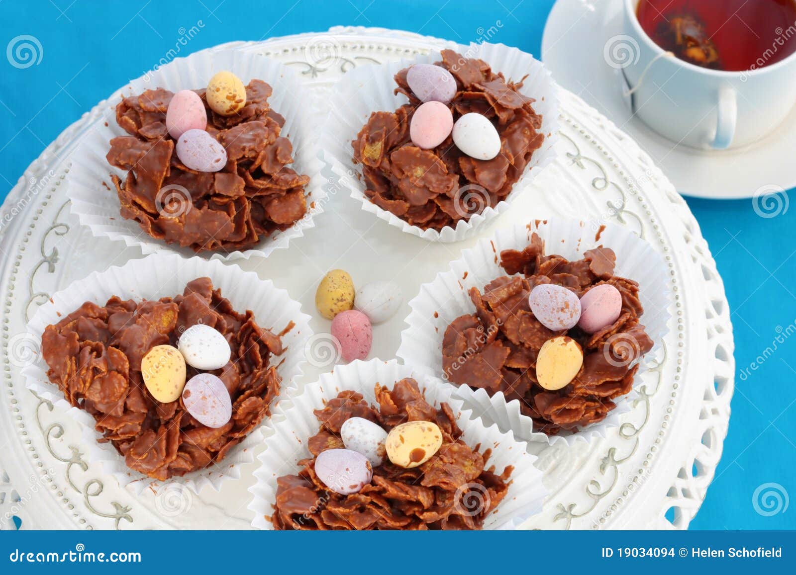 Easter Chocolate Crispy Cakes & a Cup of Tea Stock Photo - Image of ...