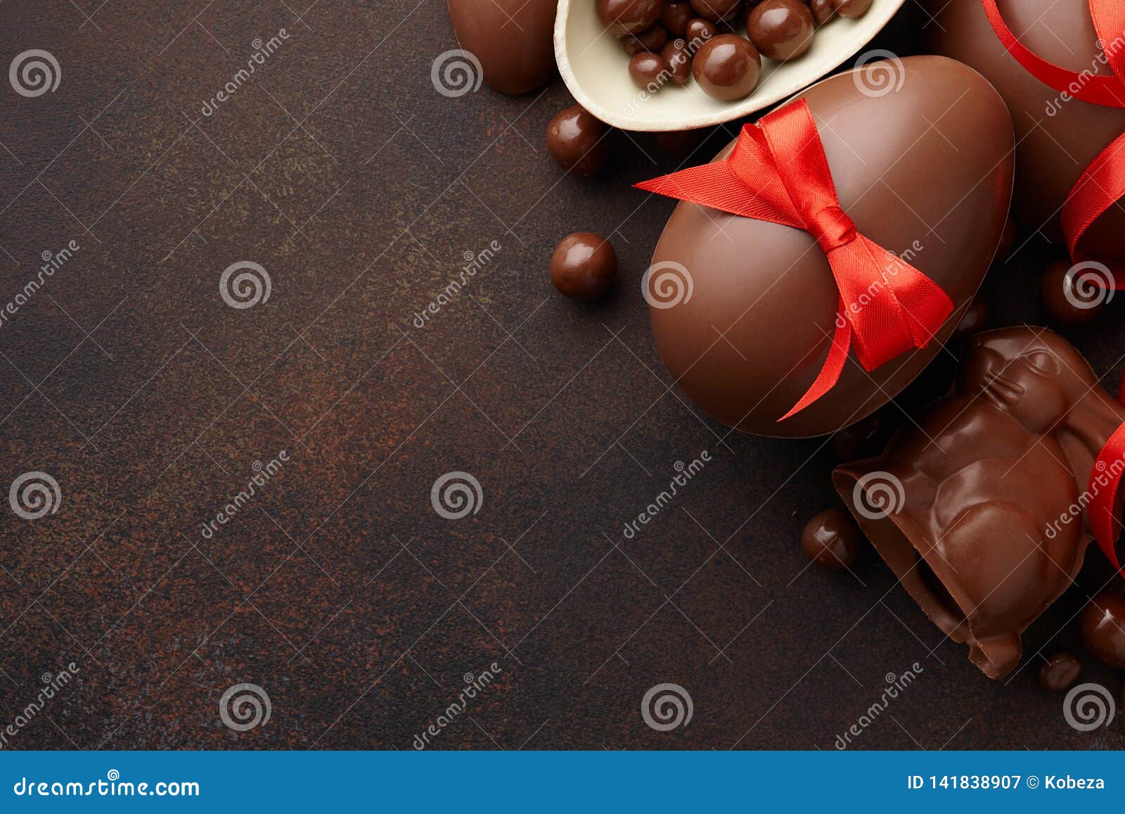 Easter Composition With Chocolate Eggs And Bunny Picture. Image: 141838907