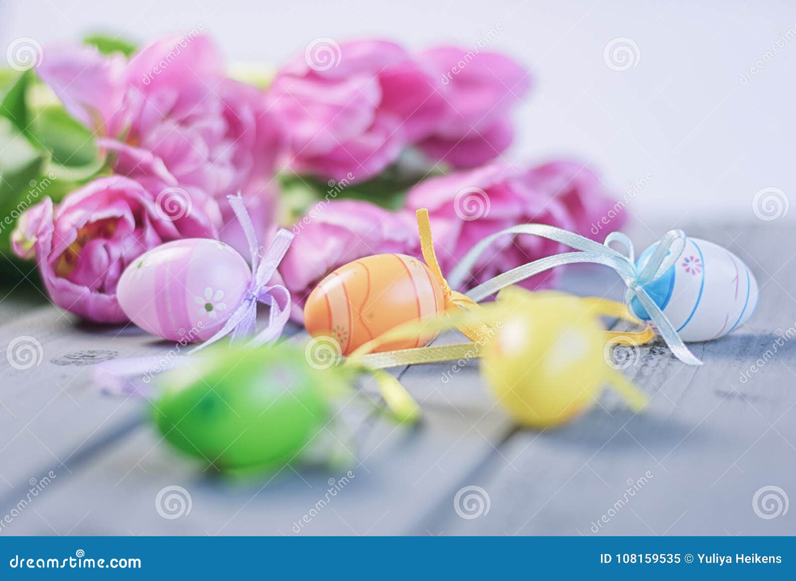 Easter Composition of Pink Roses and Colored Easter Eggs Stock Image ...