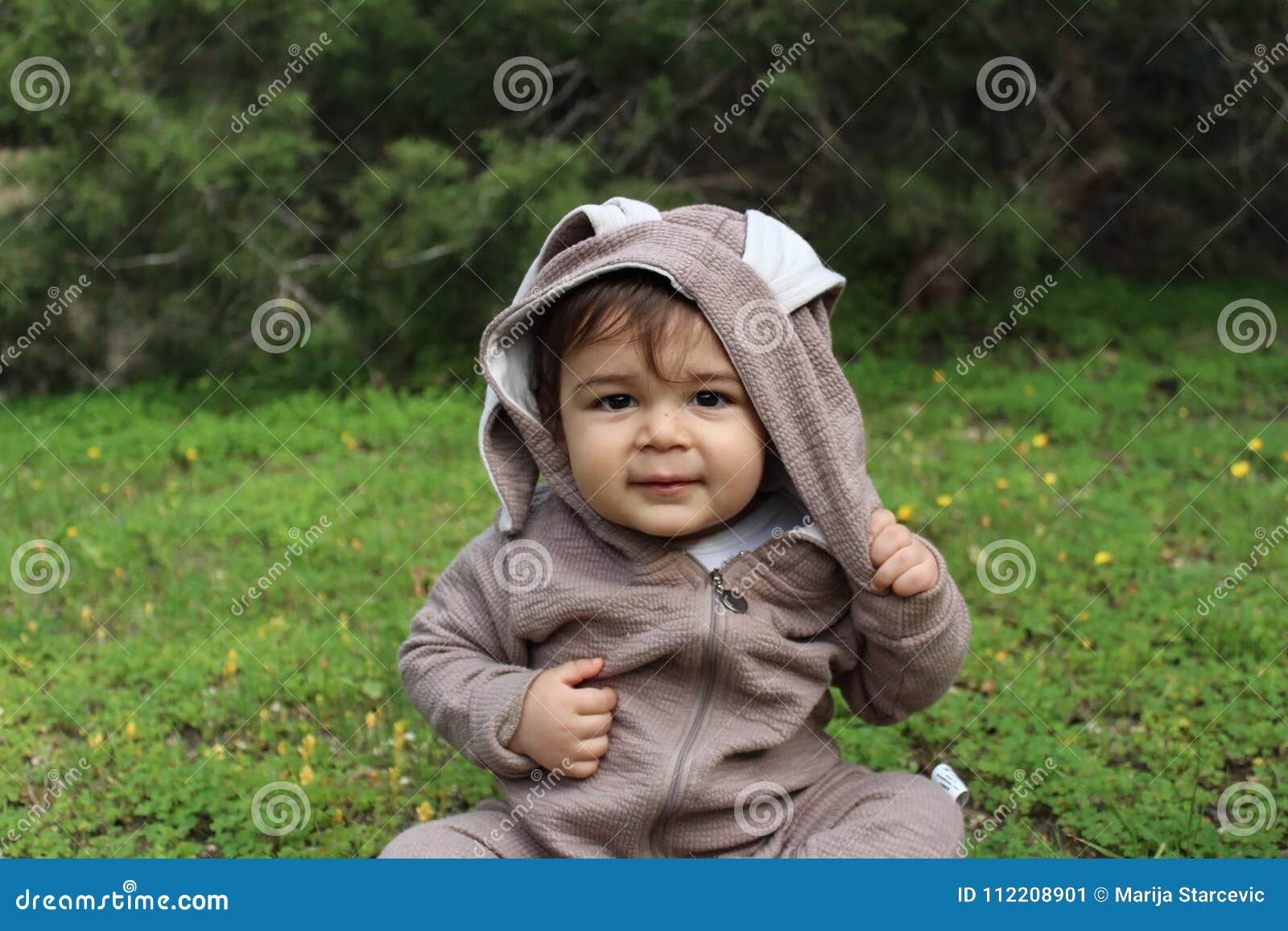 One Year Baby Boy Playing on the Grass in Rabbit Suit Stock Image ...