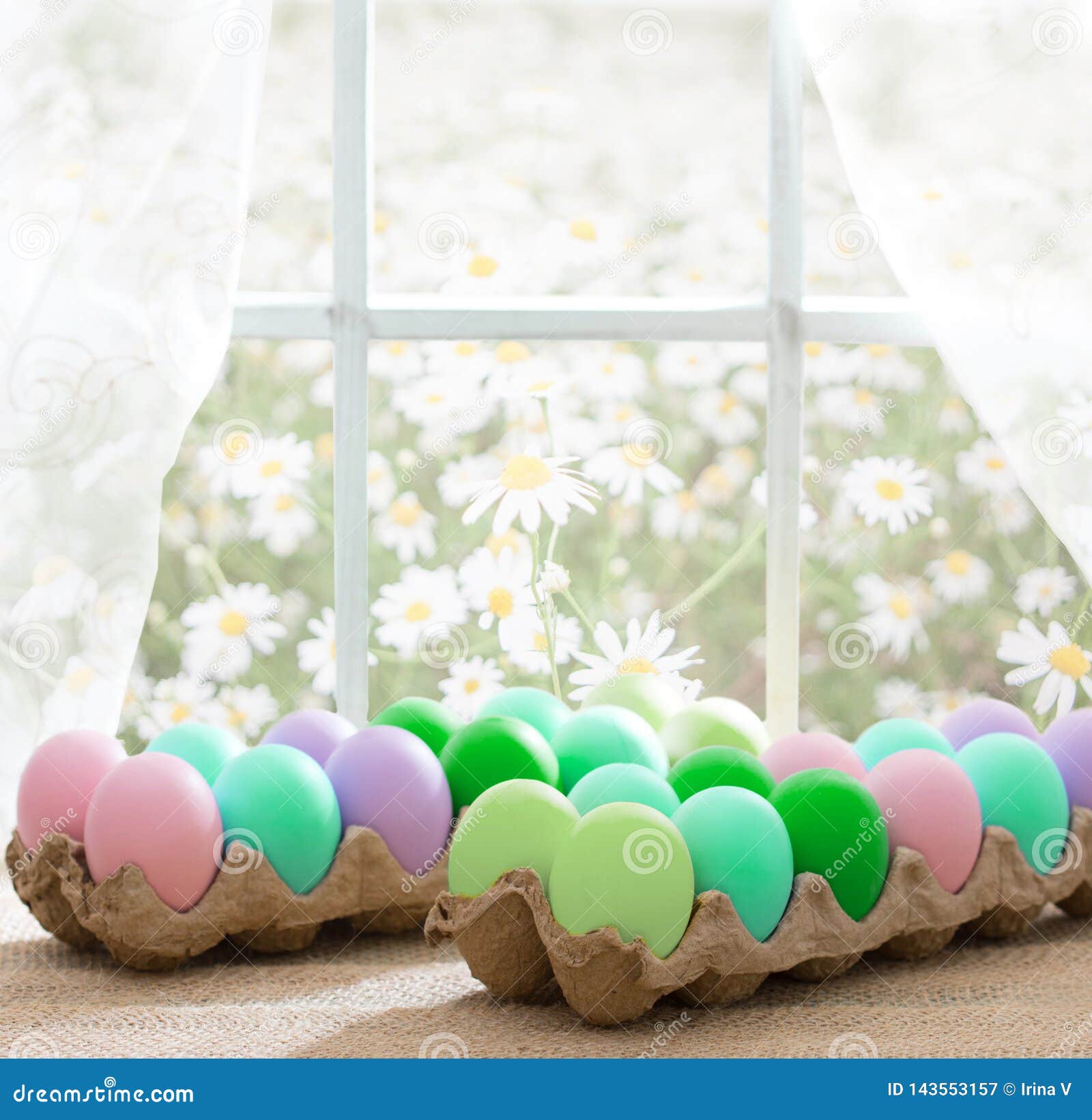 Easter Countryside Theme: Colorful Eggs in an Egg Crate on the Window ...