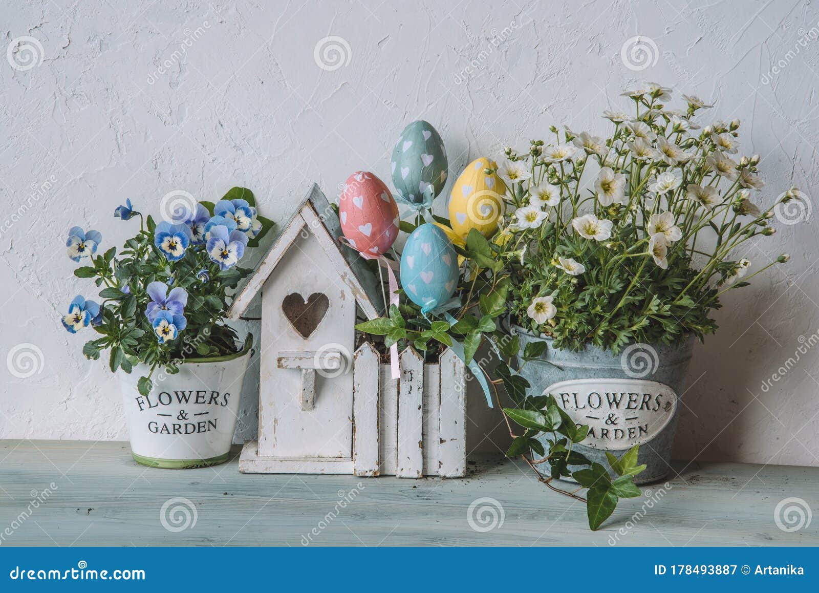 Easter Decor with Bird House and Spring Flowers Stock Image - Image of ...