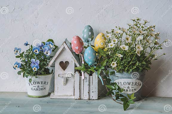 Easter Decor with Bird House and Spring Flowers Stock Image - Image of ...
