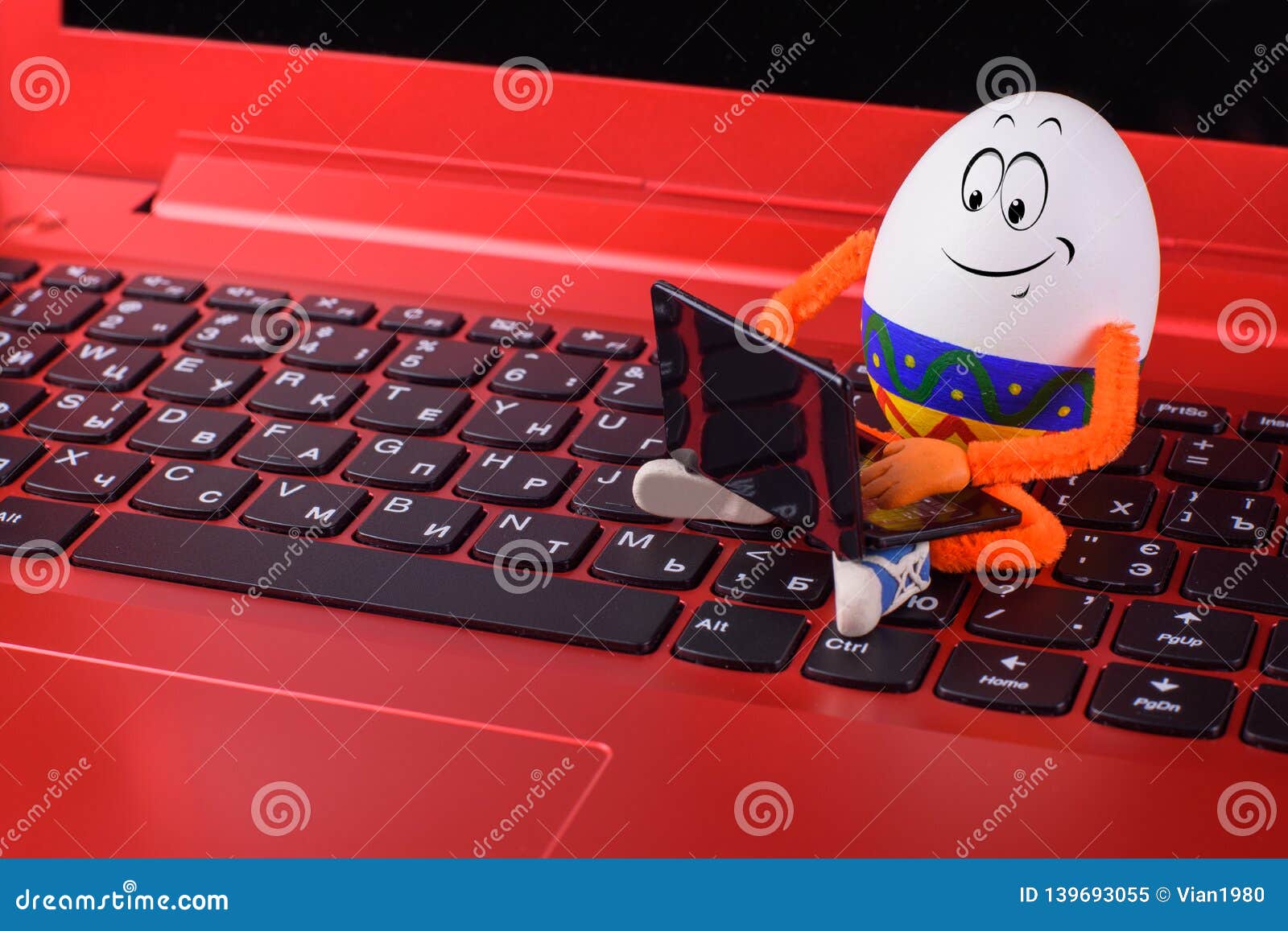 Easter Egg Sitting on a Keyboard of Notebook Stock Image - Image of ...