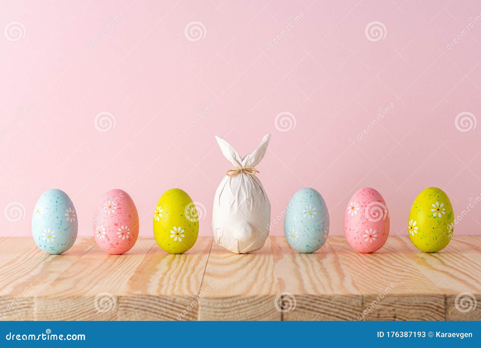 Easter Egg Wrapped in a Paper in the Shape of a Bunny with Colorful ...