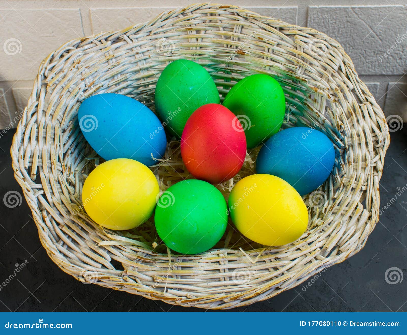 Easter eggs in a basket stock photo. Image of colored - 177080110