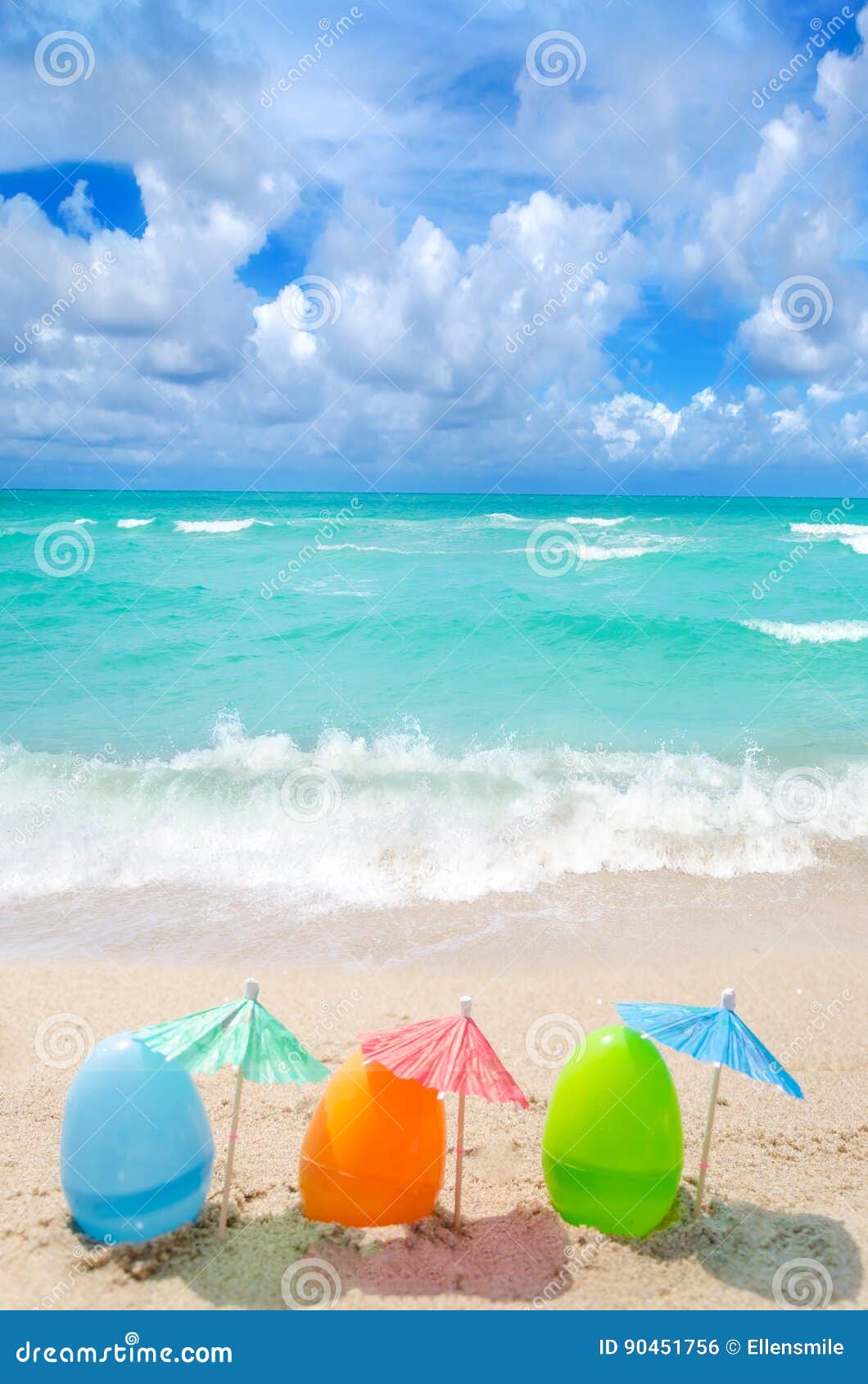 Easter eggs on the beach stock photo. Image of umbrella - 90451756