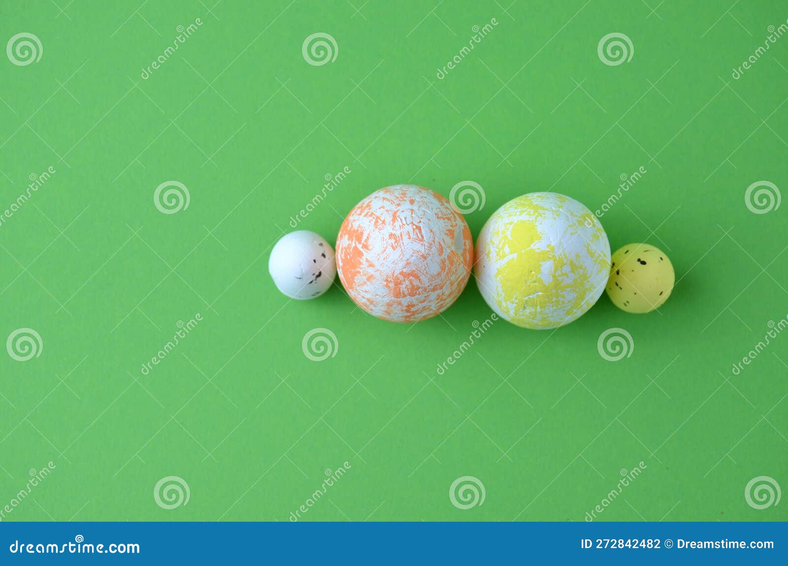 Easter Eggs of Different Sizes. View from Above. Green Background ...