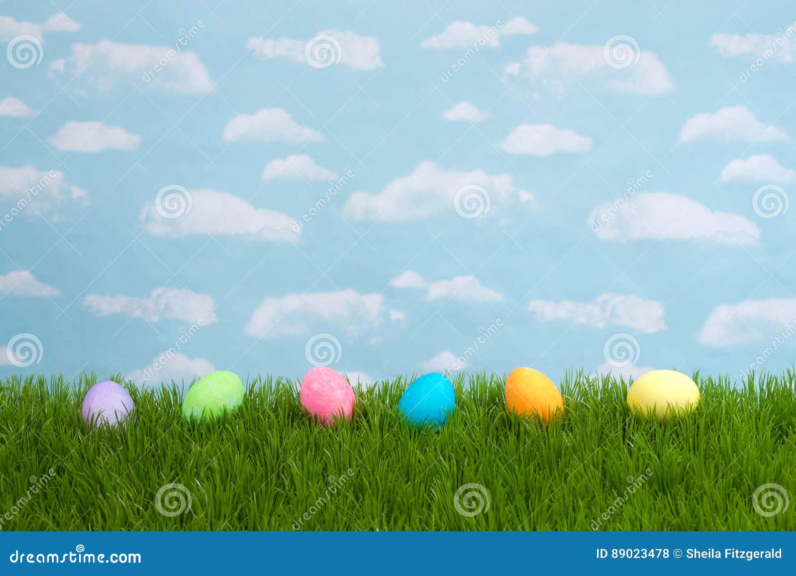 Easter Eggs on Grass, Sky Background Stock Photo - Image of spring ...