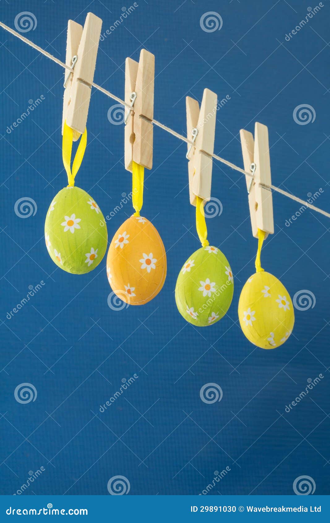 Easter Eggs Hanging from a Washing Line Stock Photo - Image of wrapped ...