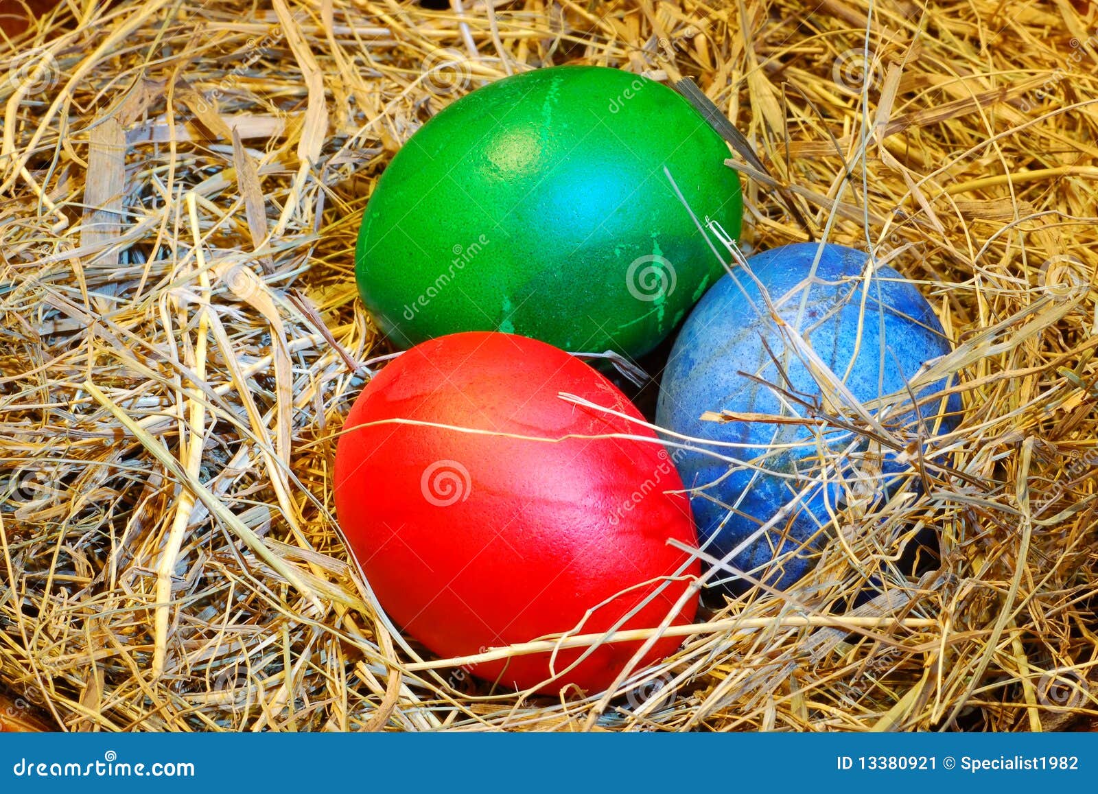 Easter eggs in hay stock image. Image of straw, april - 13380921