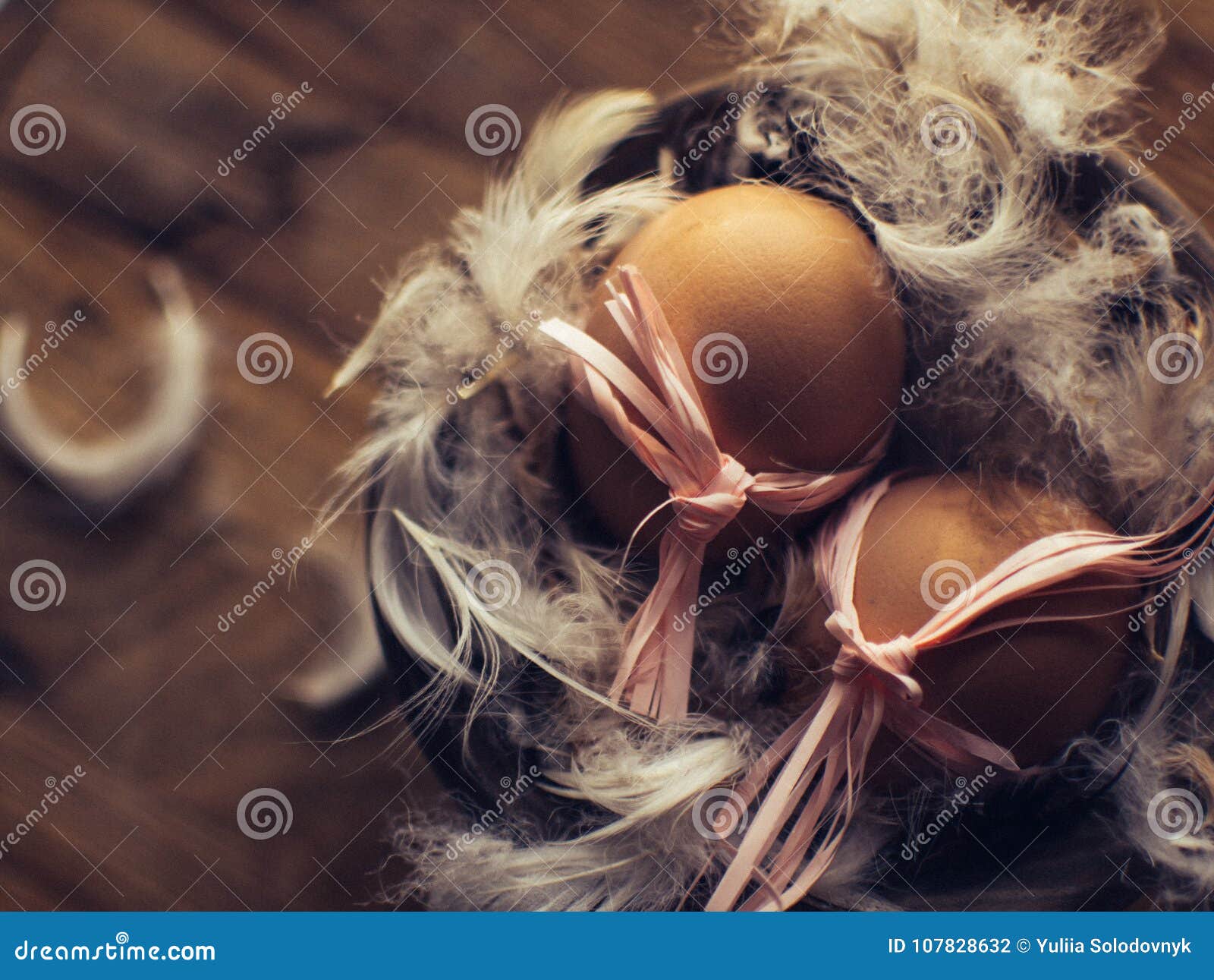 Easter Eggs in the Nest of Feathers. Stock Photo - Image of feeder ...