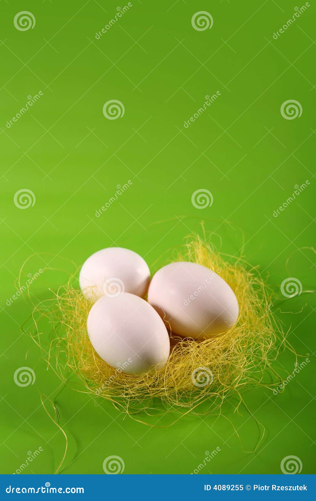 Easter Eggs in the Yellow Nest on Green Background Stock Image - Image ...