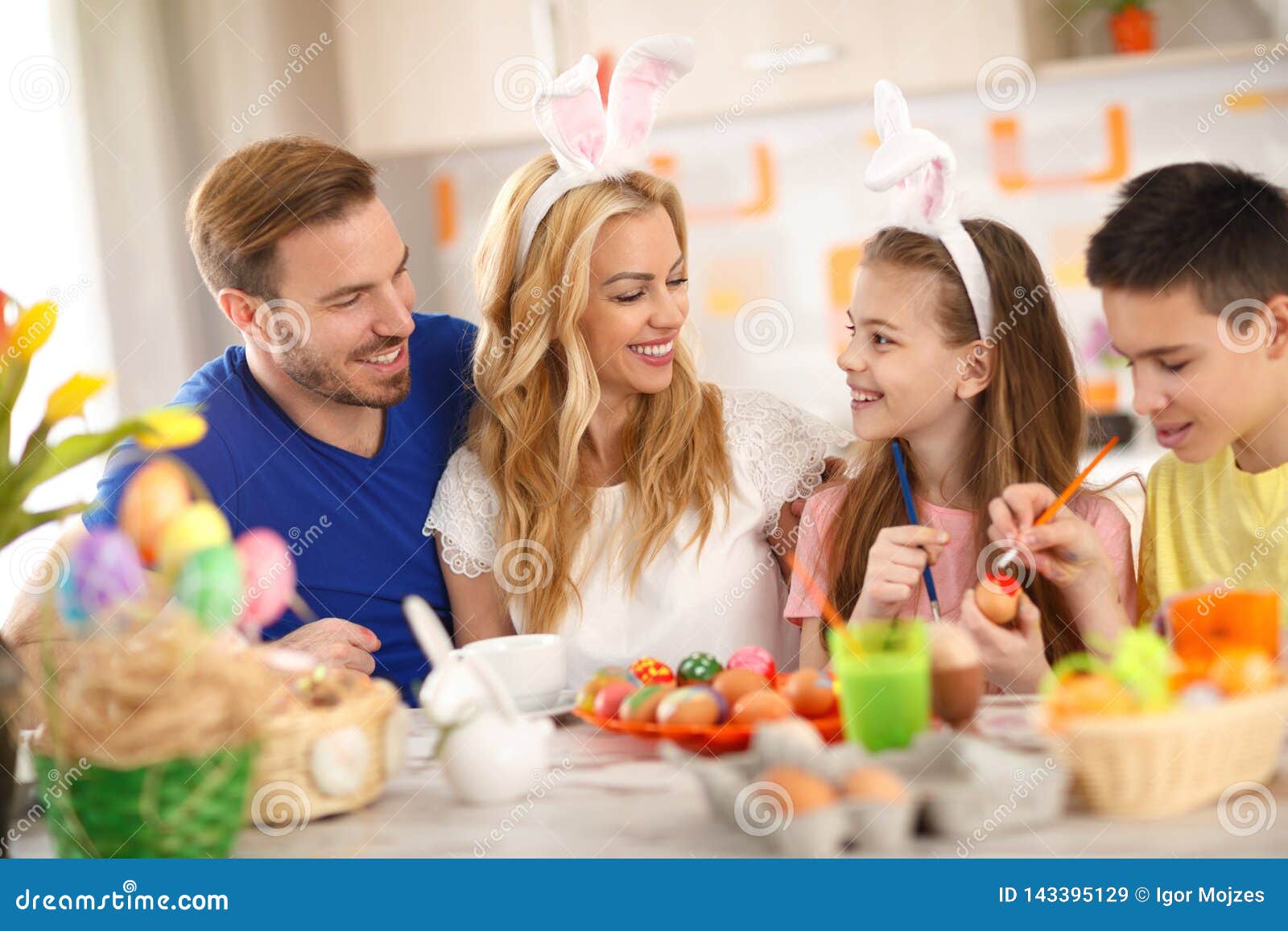 Easter in family stock image. Image of home, easter - 143395129
