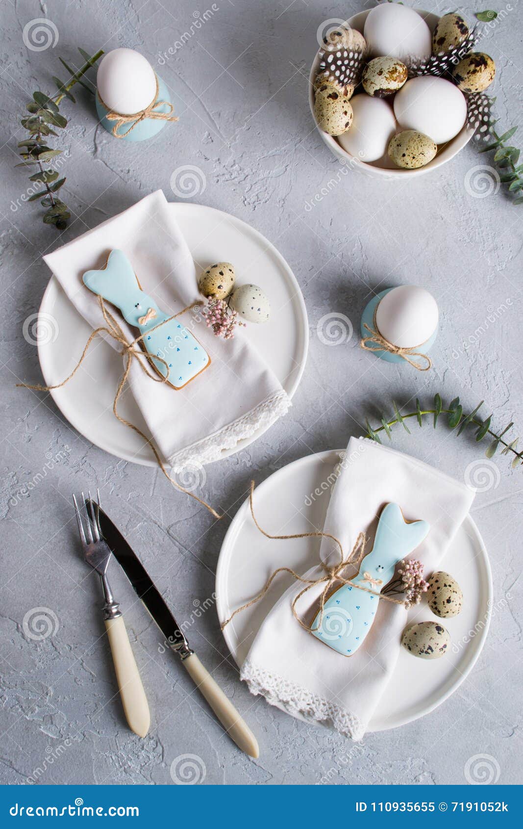 Easter Festive Table Setting with Easter Bunny Cookies, Quail Eggs and ...