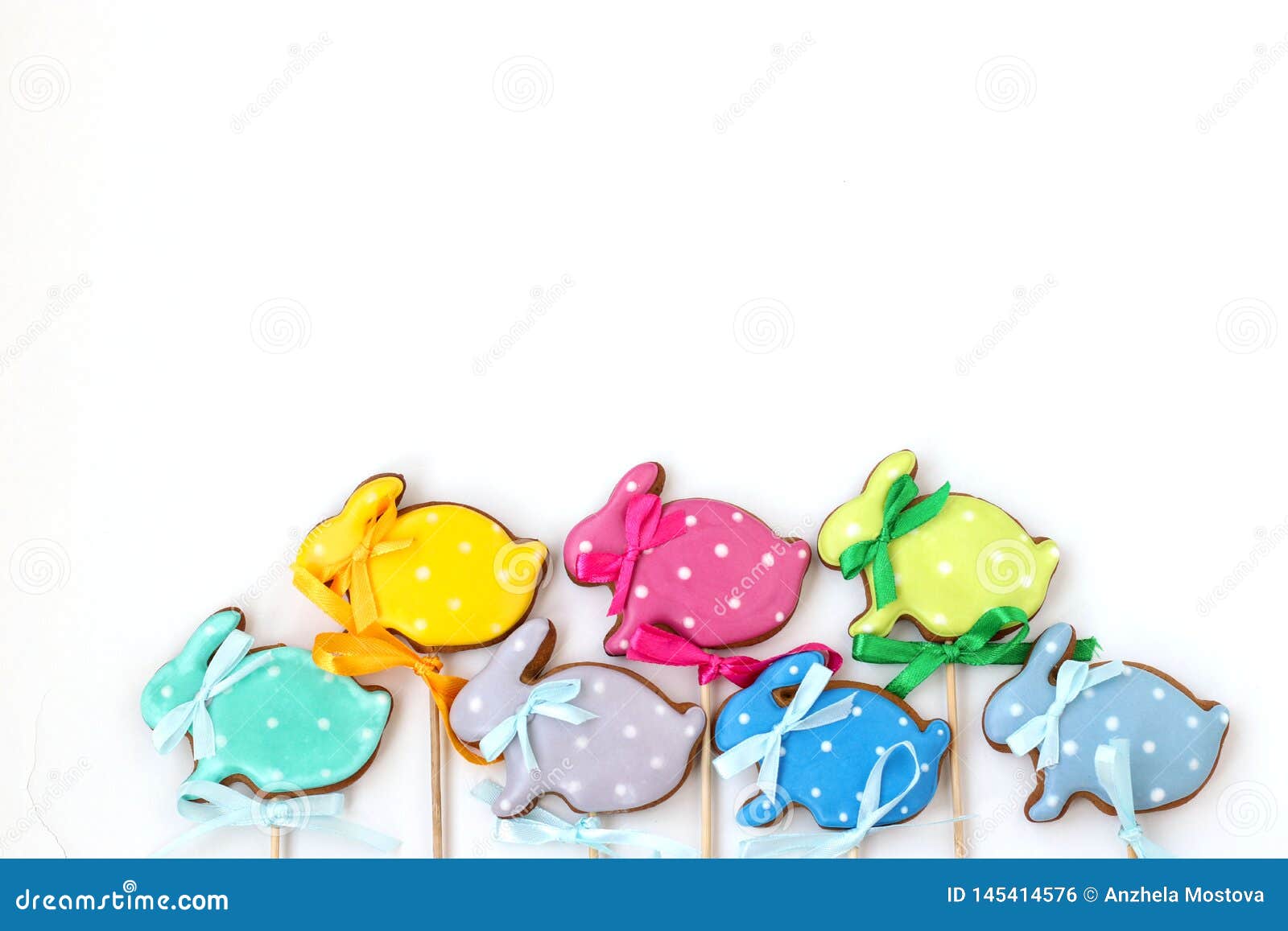 Easter Gingerbread in the Form of Cute Rabbits on Sticks Located on a ...