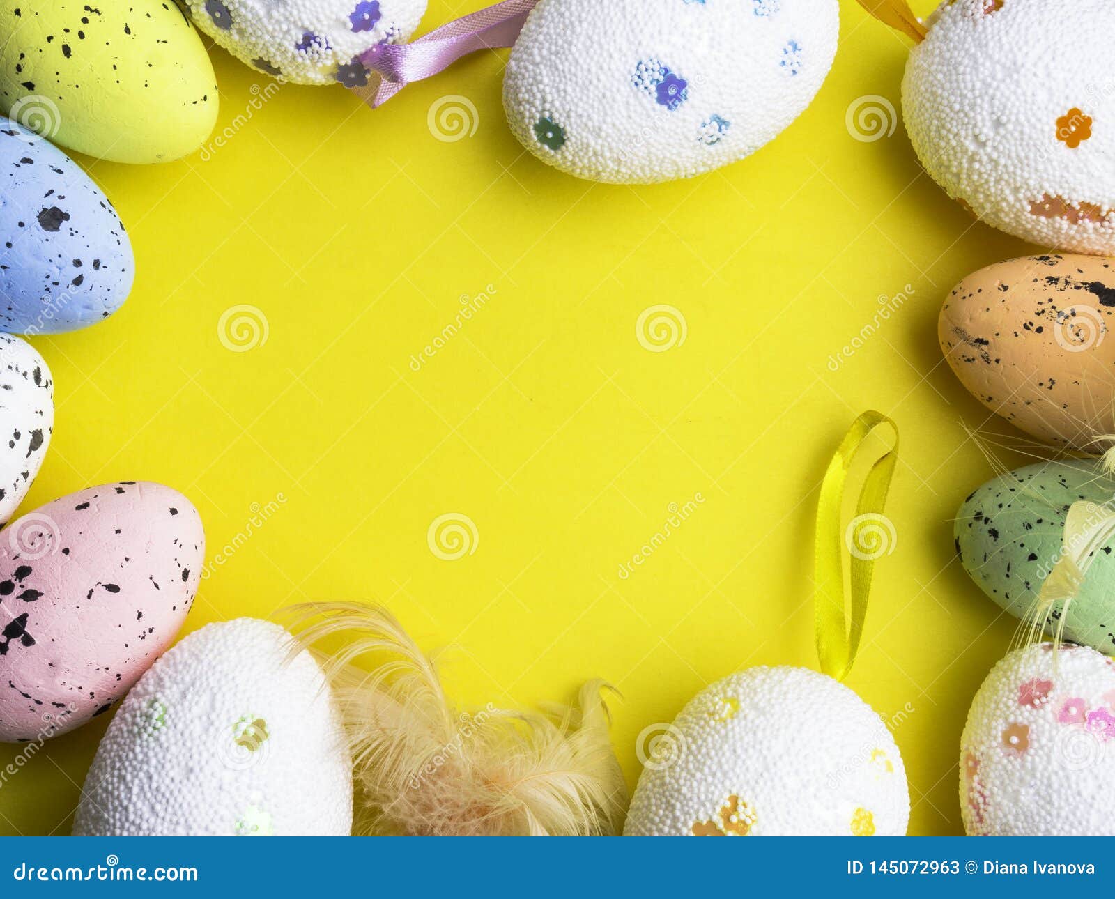 Easter Holiday Background. Decorated Easter Eggs on a Yellow Background ...