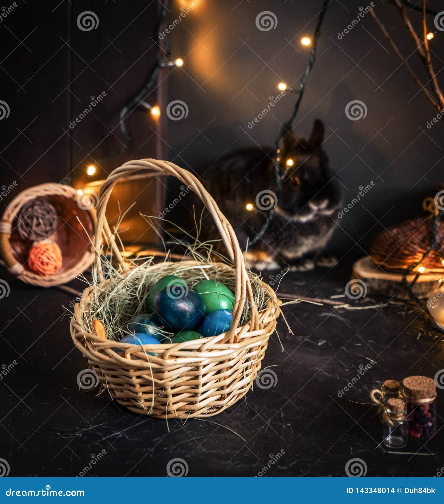 Easter Holiday: a Little Black Easter Bunny and a Wicker Basket with ...