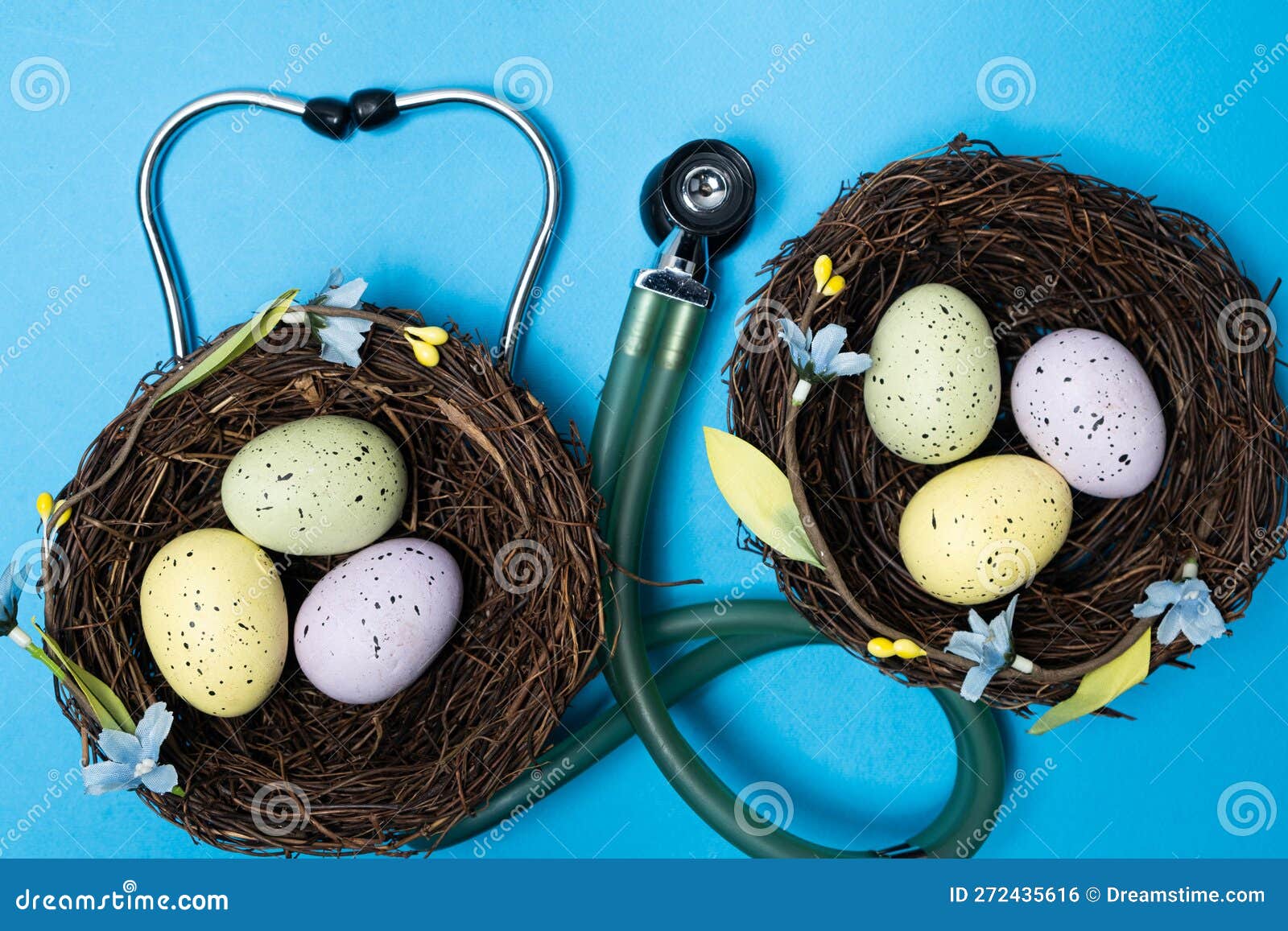 Easter Medicine. Two Nests with Painted Eggs and a Stethoscope on a ...