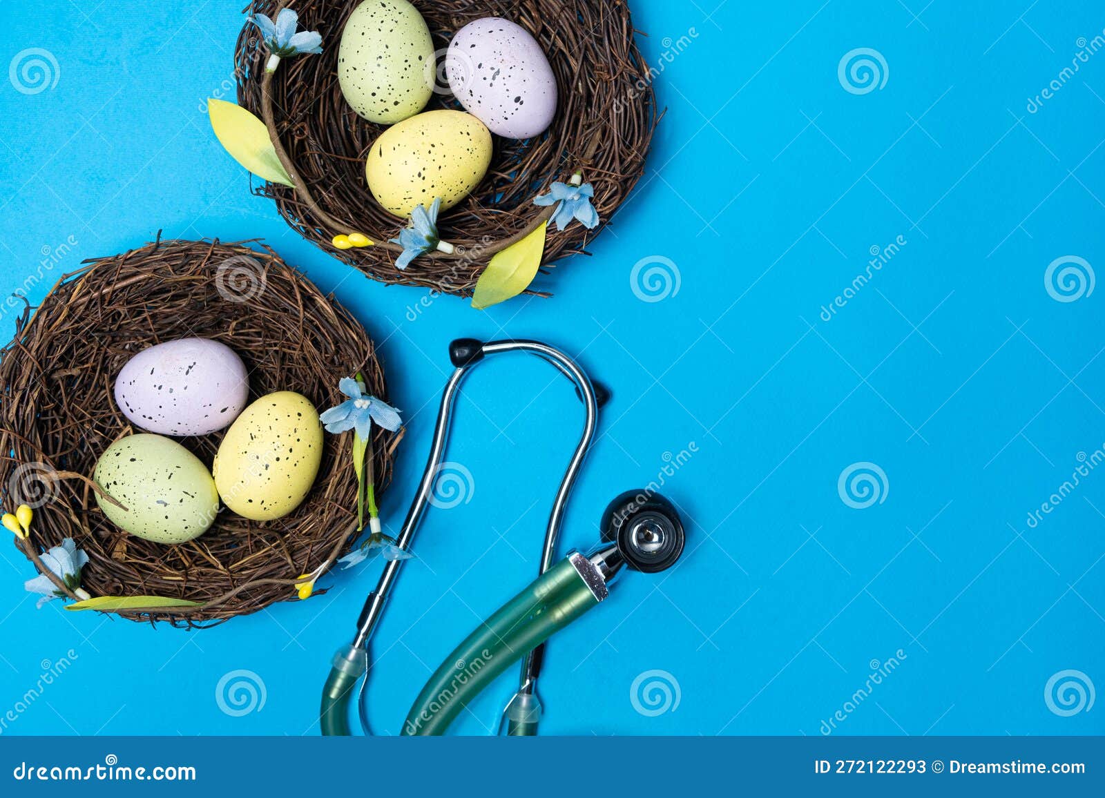 Easter Medicine. Two Nests with Painted Eggs and a Stethoscope on a ...