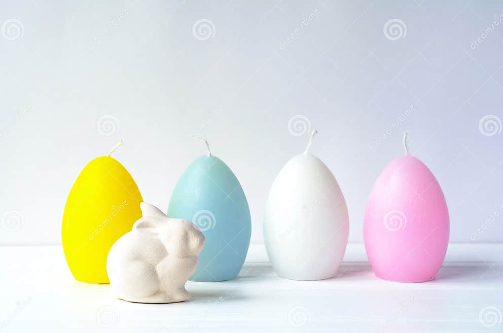 Easter Ostara, Eoster Bunny with Egg Shaped Candles Stock Image - Image ...