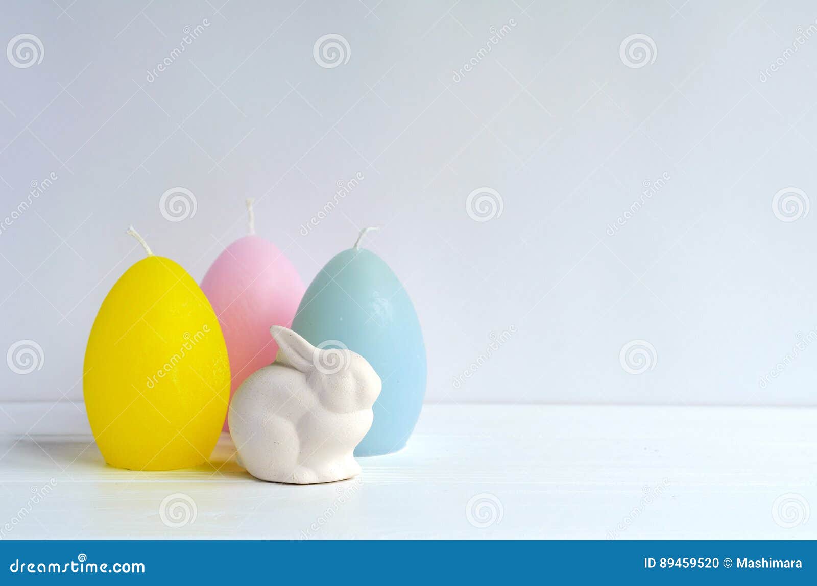 Easter Ostara, Eoster Bunny with Egg Shaped Candles Stock Photo - Image ...