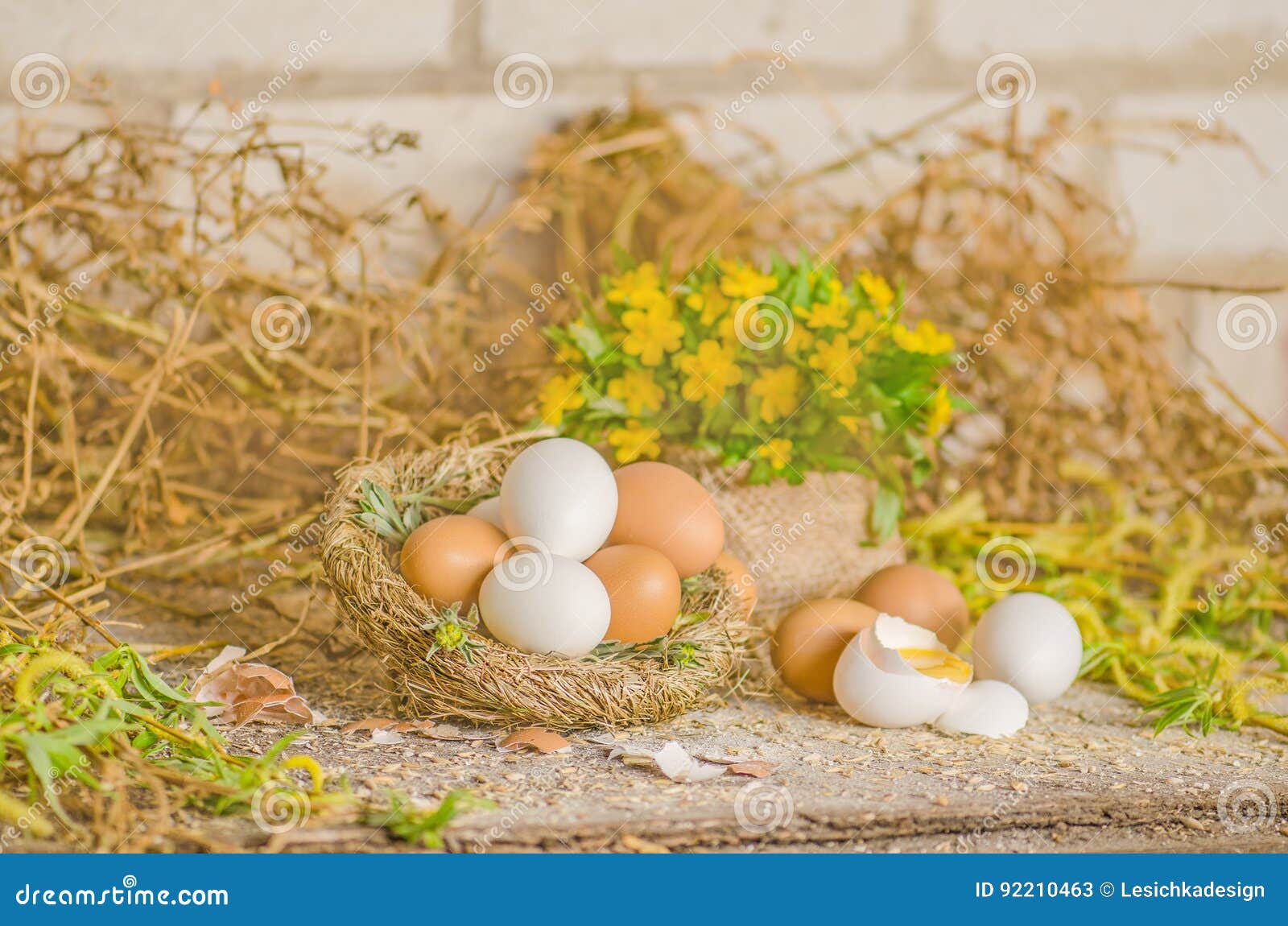 Easter Rustic Background with Chicken Eggs in Straw Nest on Old Board ...