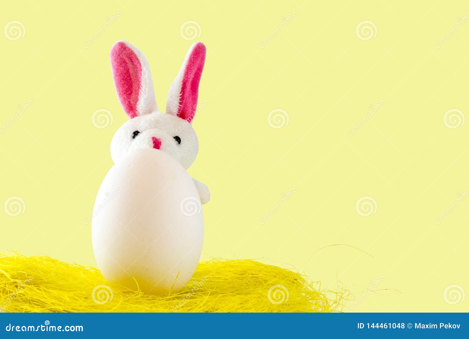 White Egg, Easter Bunny,, Yellow Background Stock Photo - Image of ...