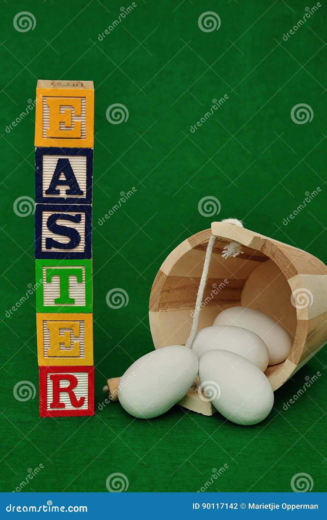 Easter Spelled with Alphabet Blocks and a Bucket of Eggs Stock Photo ...