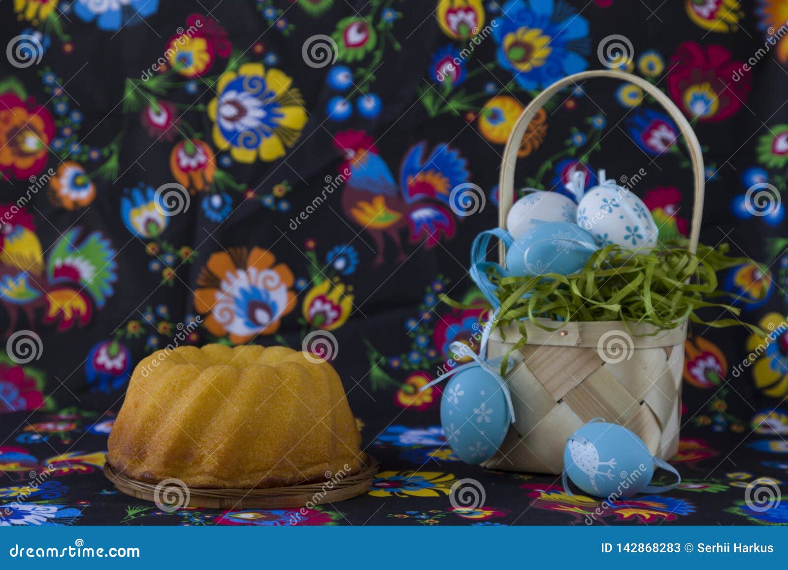 Folk Style Easter Decoration with White and Blue Eggs on Painted ...