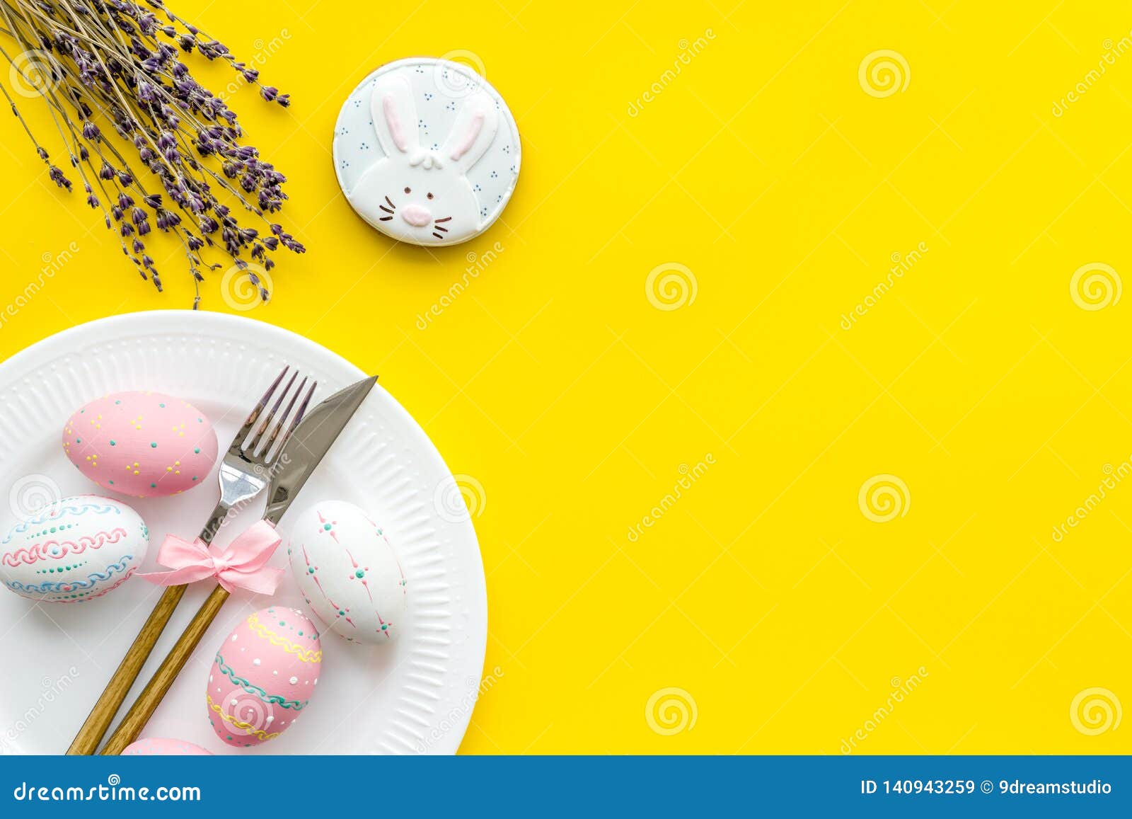Easter Table Setting. Tableware and Painted Eggs on Yellow Background ...