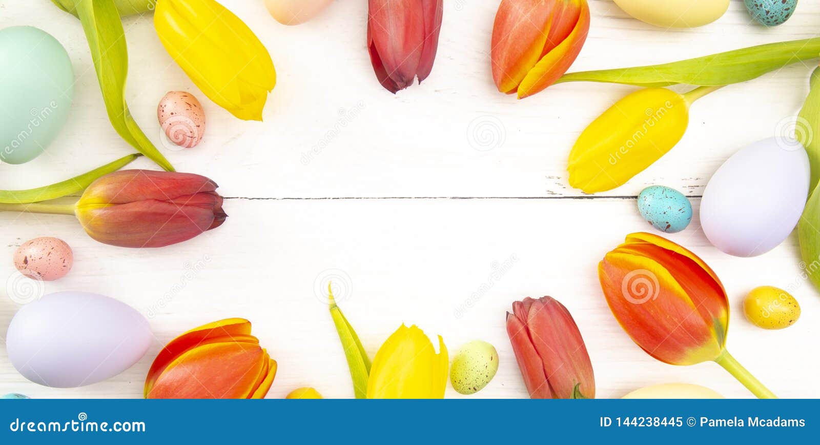 An Easter Themed Frame Background on a White Wooden Table Stock Image ...