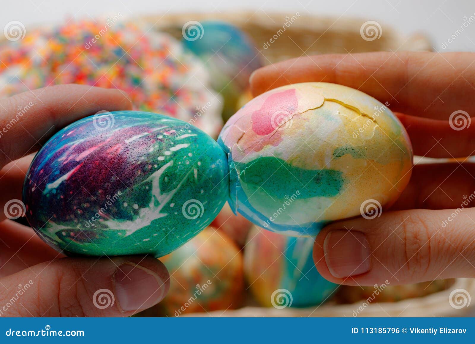 The Easter Tradition Is To Beat The Eggs. Two Hands Hold Easter Eggs ...