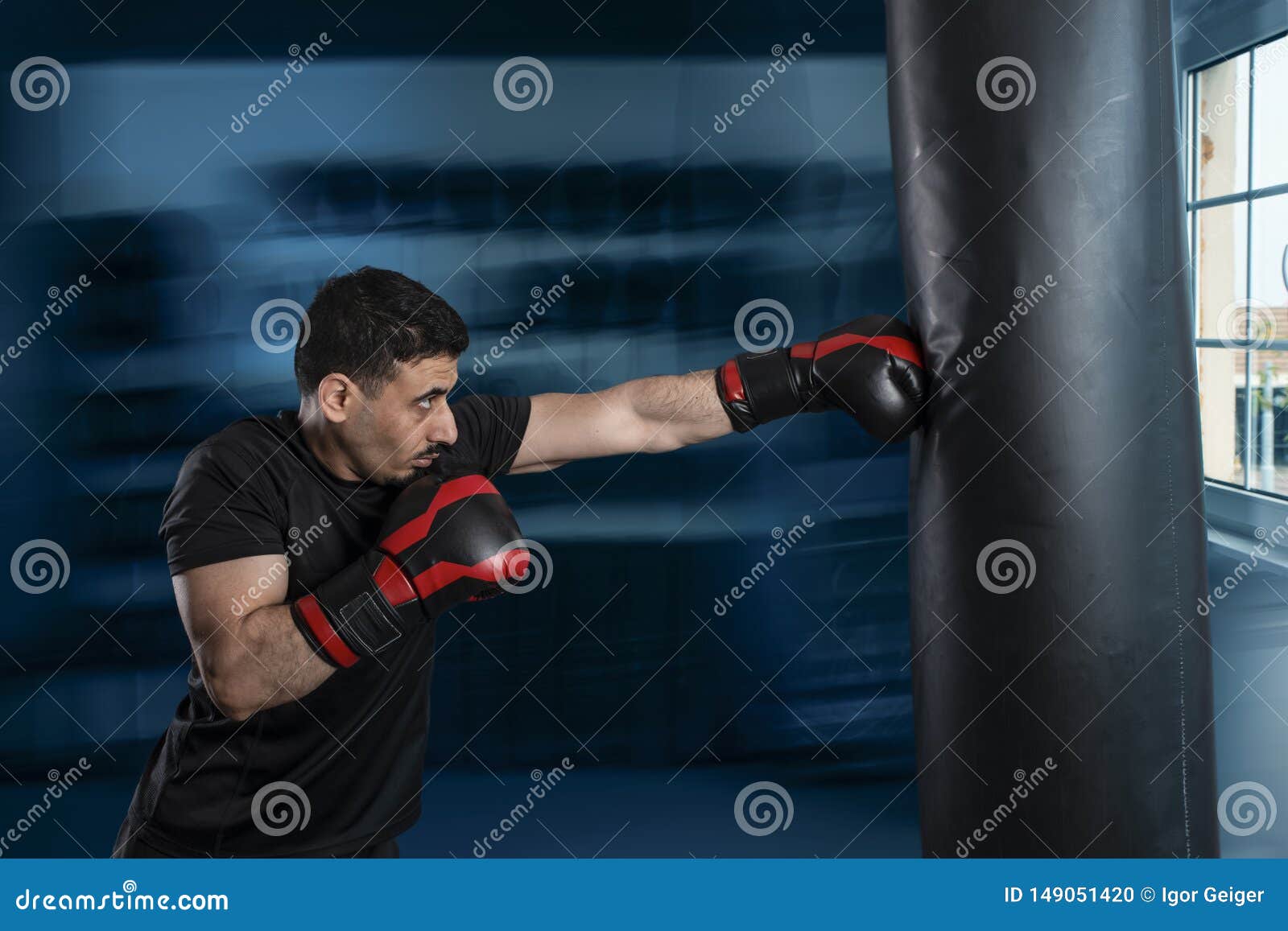 Eastern Arab Boxer Looks at the Box with a Punching Bag Stock Photo ...