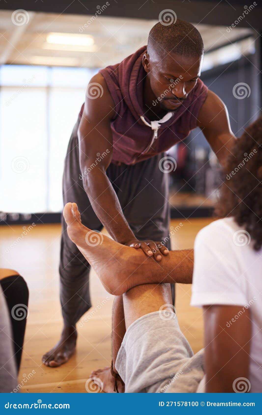 Easy Does it. a Dance Instructor Helping His Student To Warm Up in a ...