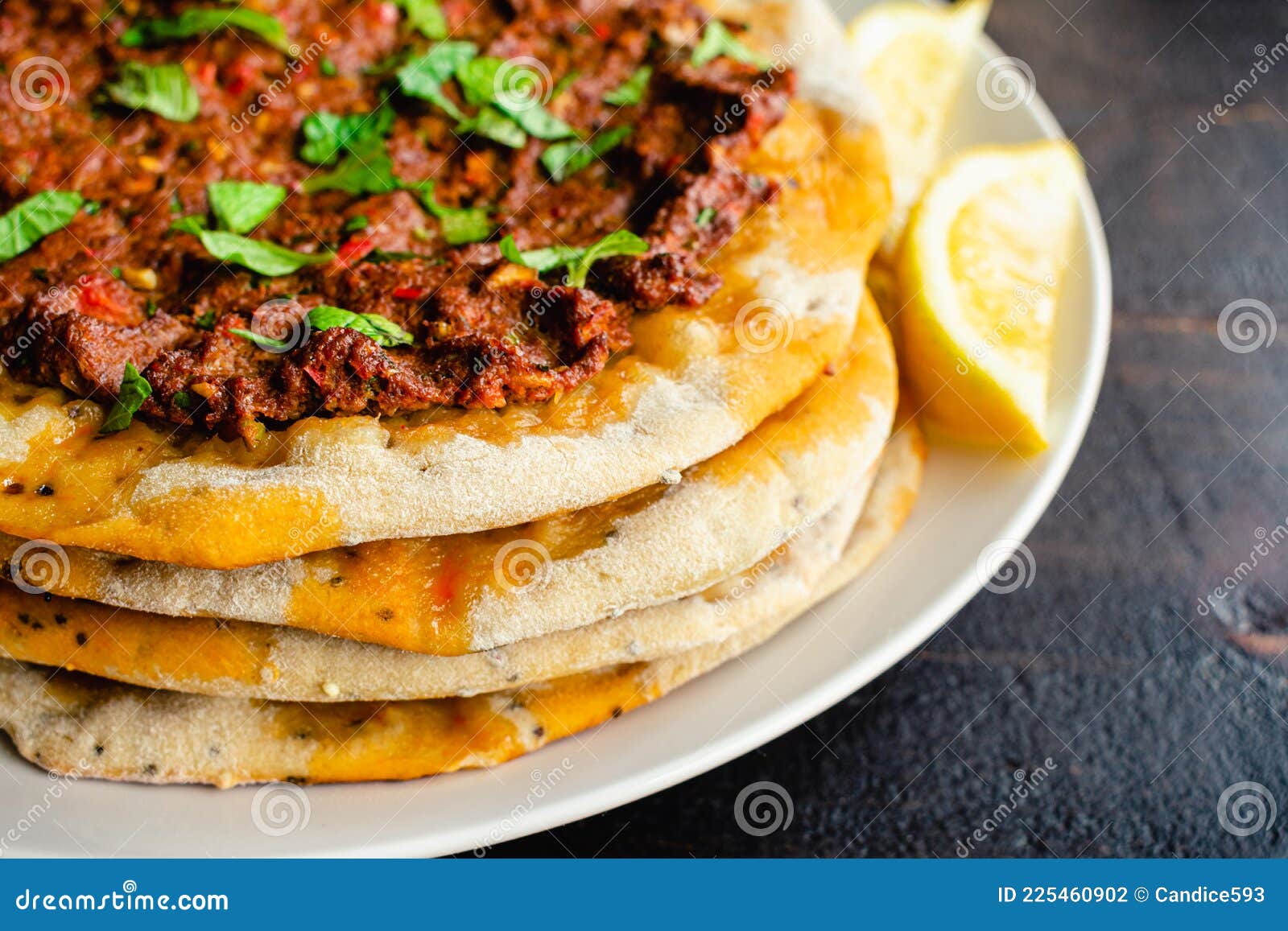 Closeup View of Turkish Lahmacun Served with Lemon Wedges Stock Photo ...
