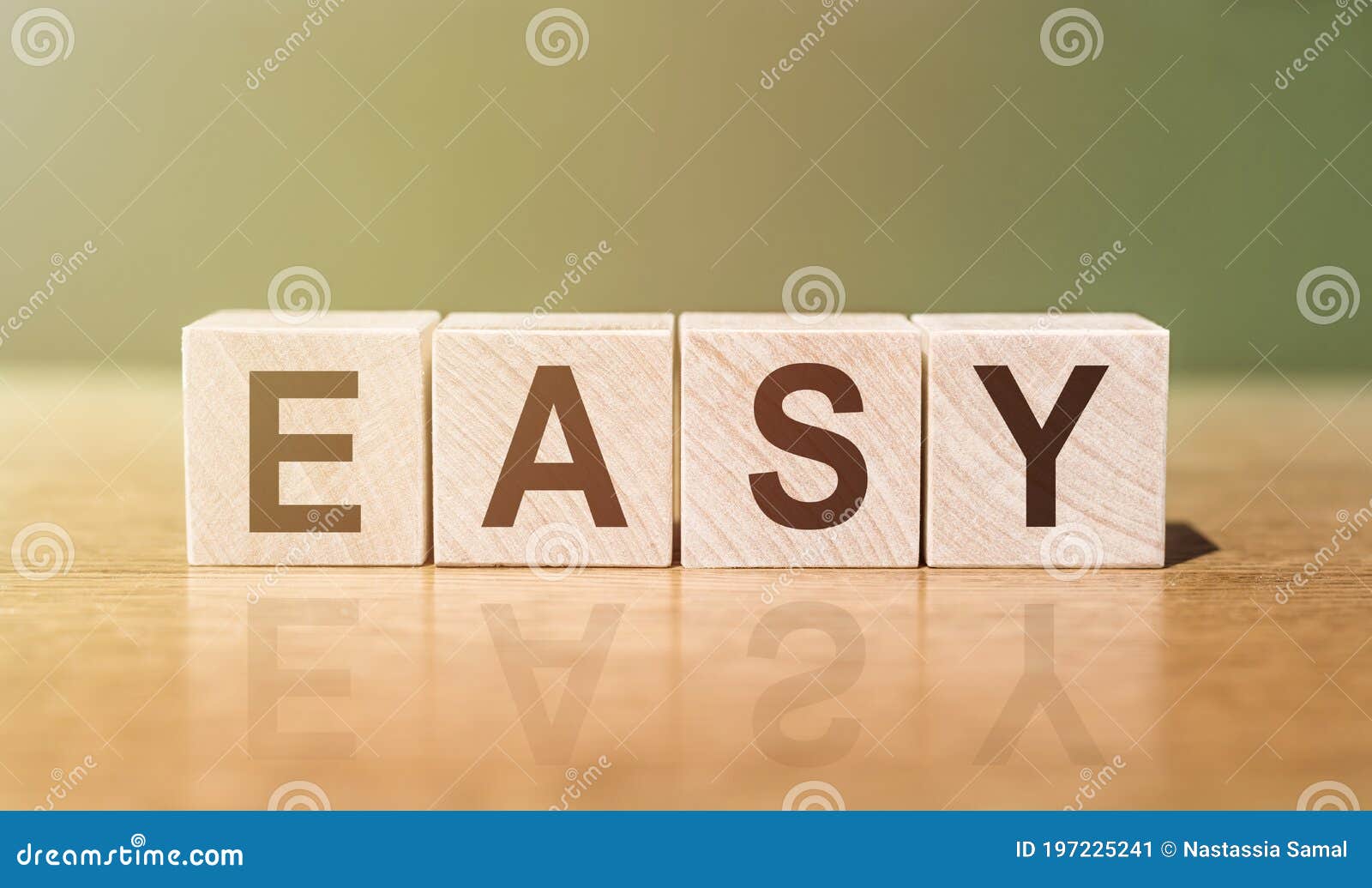 Easy Word Written on Wood Cubes with Green Background Stock Image ...