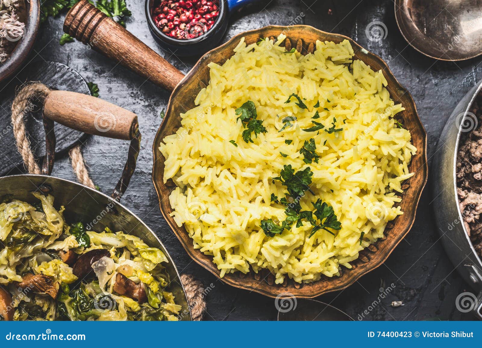 Easy Yellow Rice Flavored with Saffron in Cooking Pan on Rustic ...