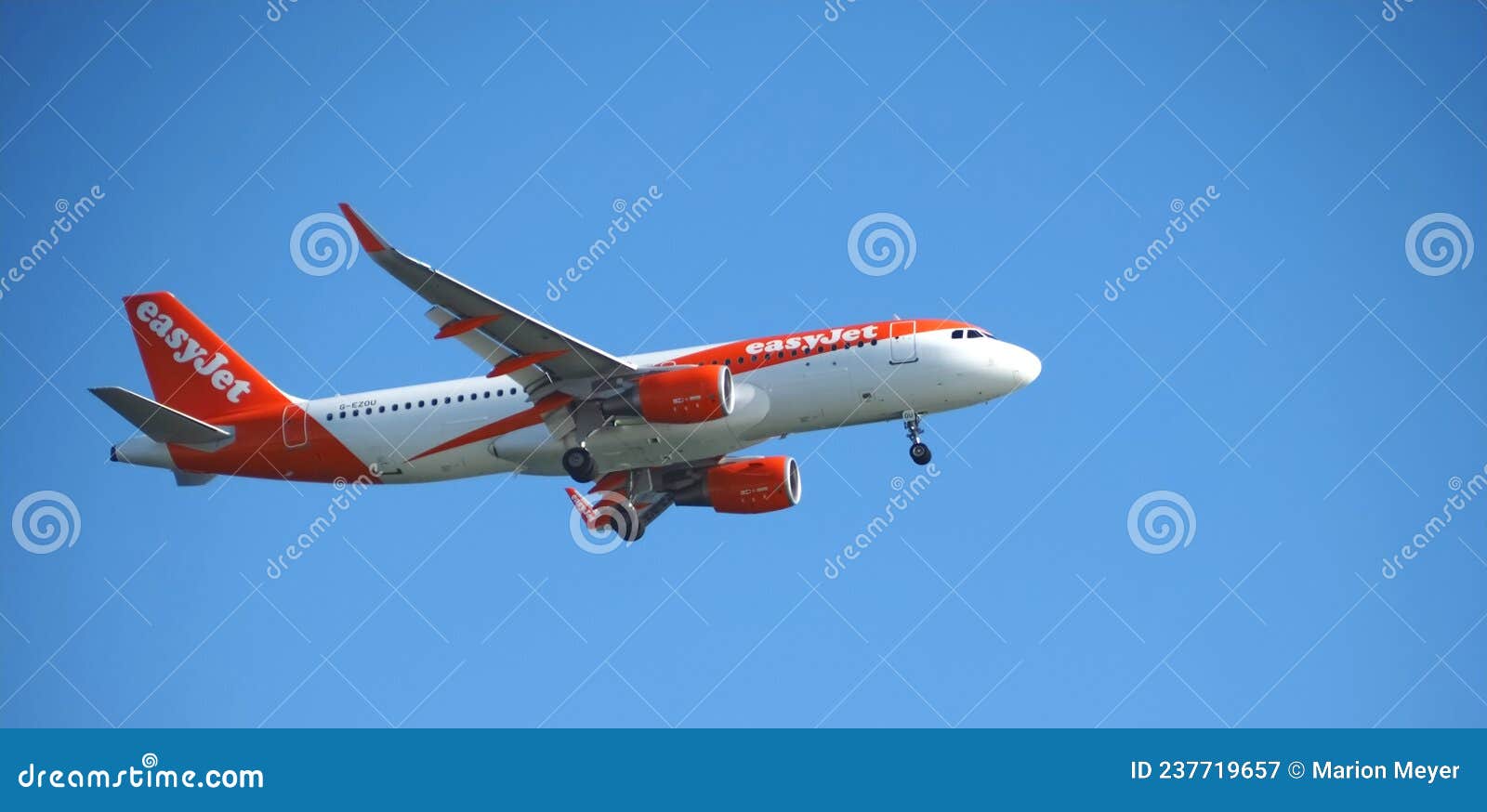 EasyJet Airplane Flying at Blue Sky Editorial Photography - Image of ...