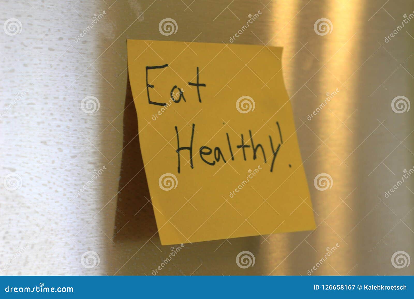 Eat Healthy Wrote on a Sticky Note Stock Image - Image of message ...
