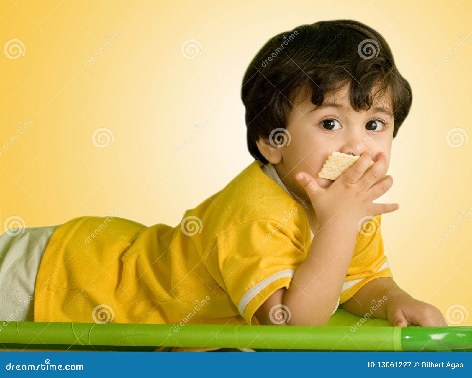 Eating stock image. Image of yellow, shirt, looks, curly - 13061227