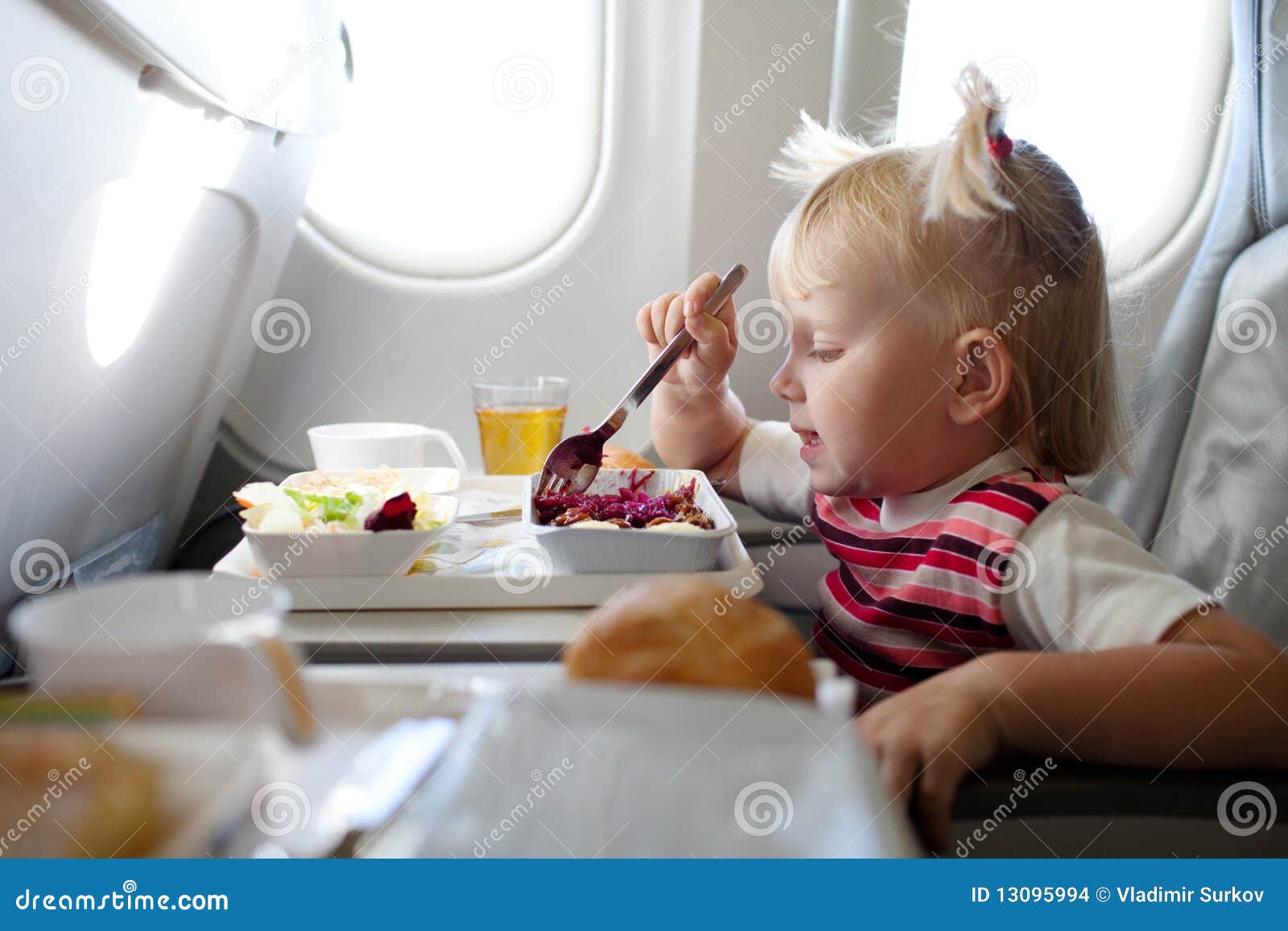 Eating in the airplane stock photo. Image of childhood - 13095994