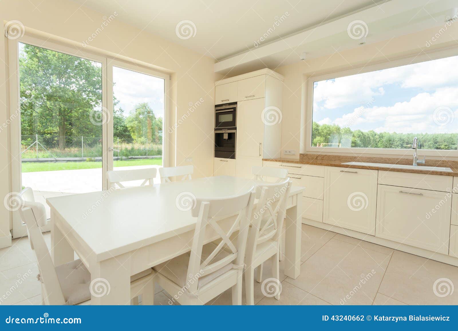 Eating Area in Bright Kitchen Stock Photo - Image of estate, kitchen ...