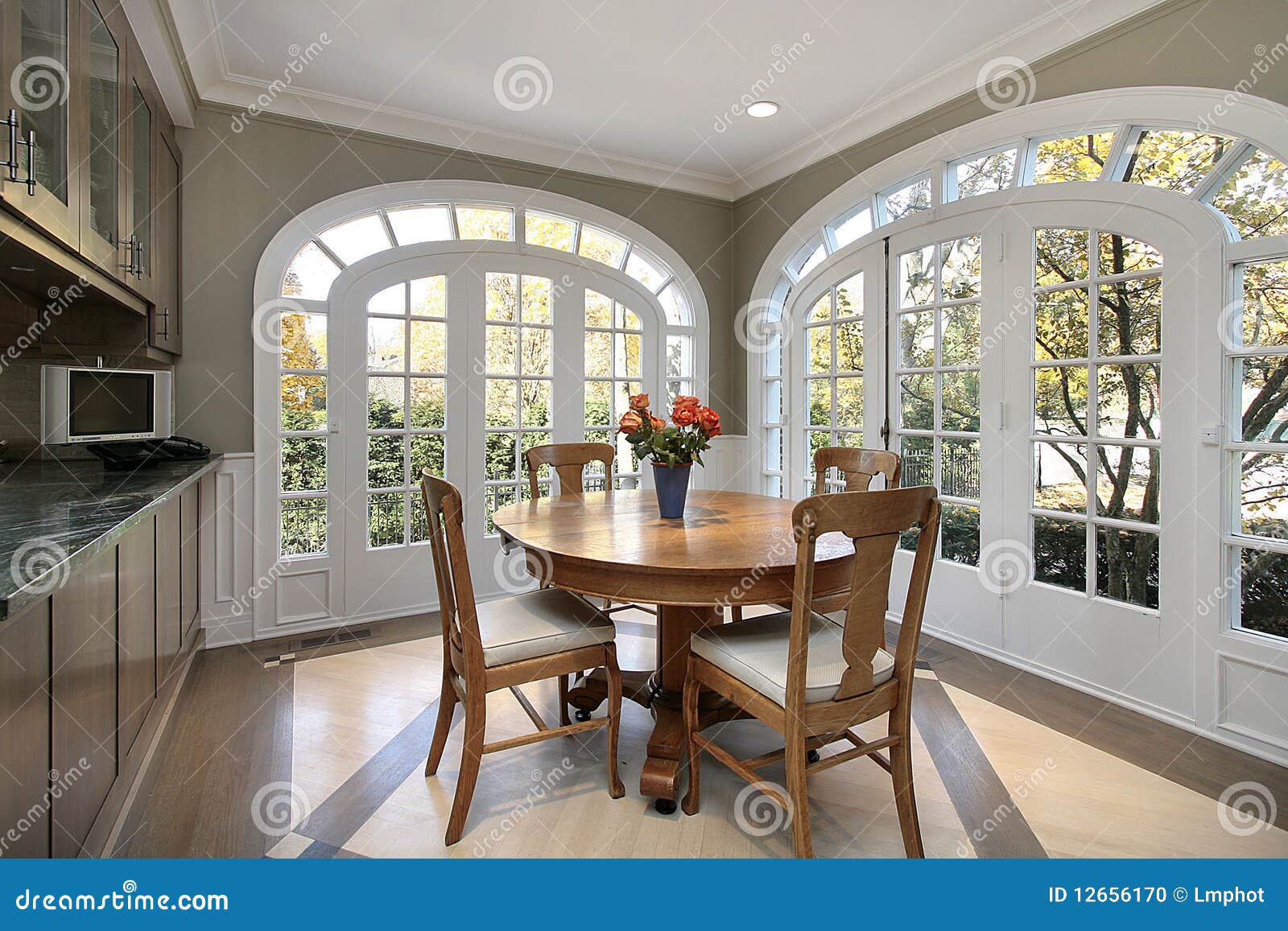 Eating Area with Circular Windows Stock Photo - Image of residence ...