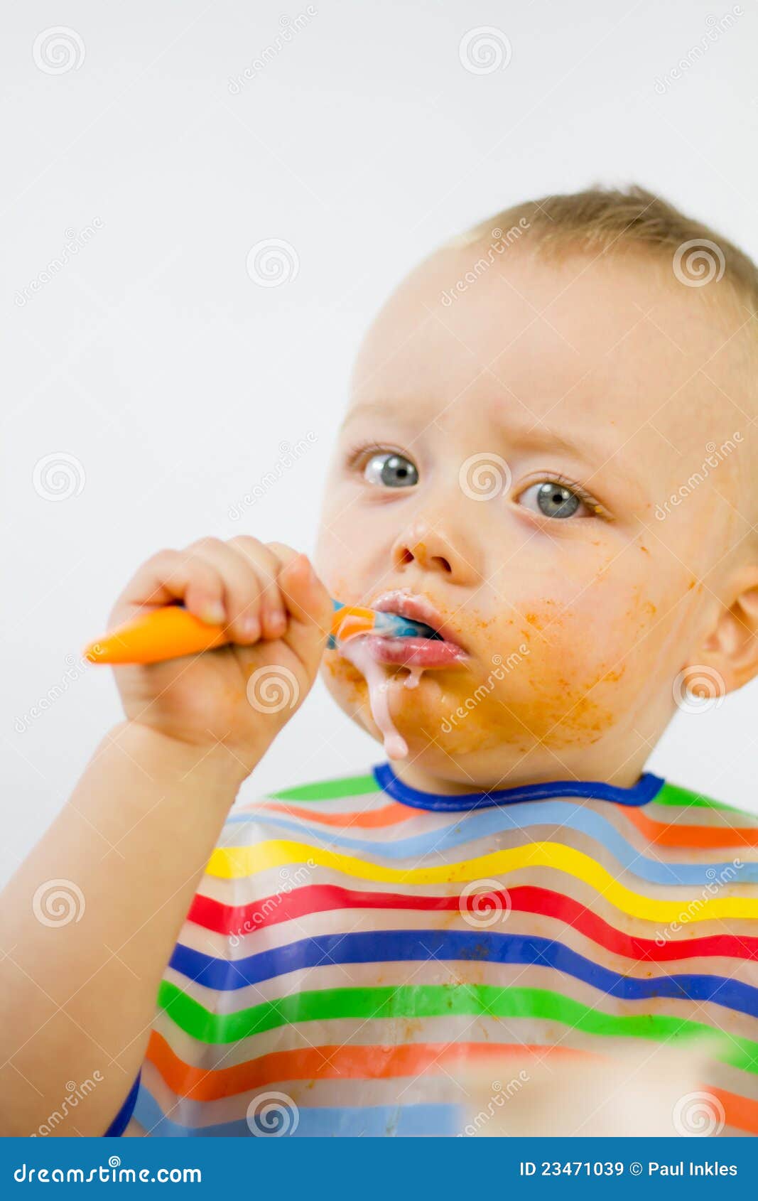 Eating Babies Food Messily stock image. Image of lighting - 23471039