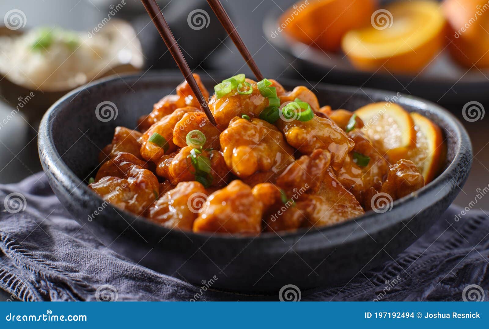 Eating Bowl of Chinese Orange Chicken with Chopsticks Stock Photo ...